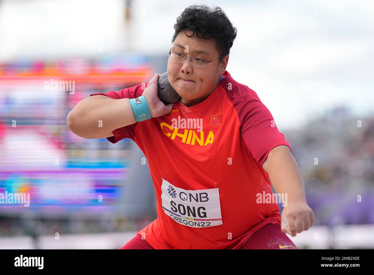 Jiayuan Song, of China, competes during the women's shot put final at ...