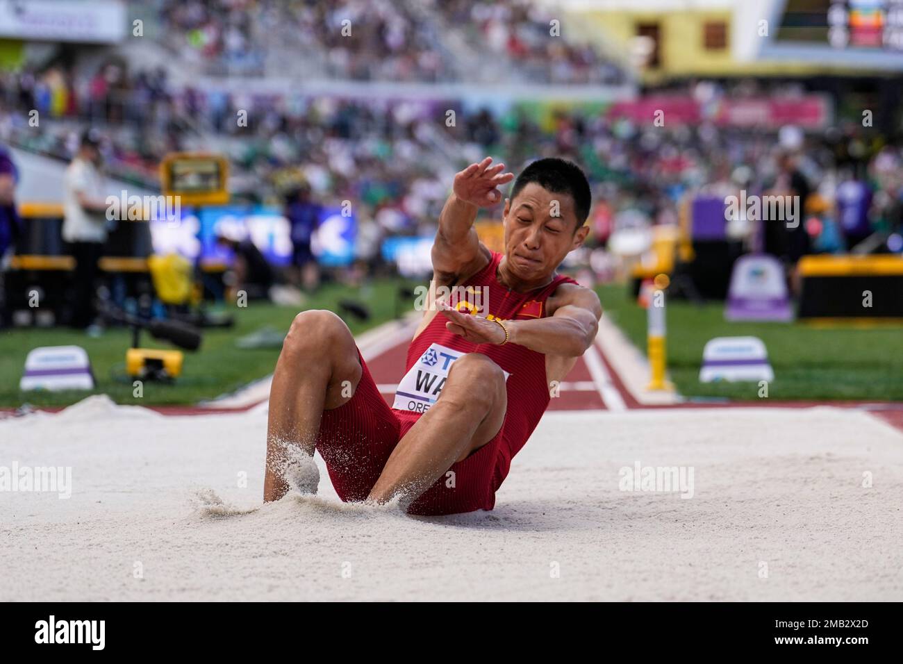 Wang Jianan, of China, competes during the men's long jump final at the ...