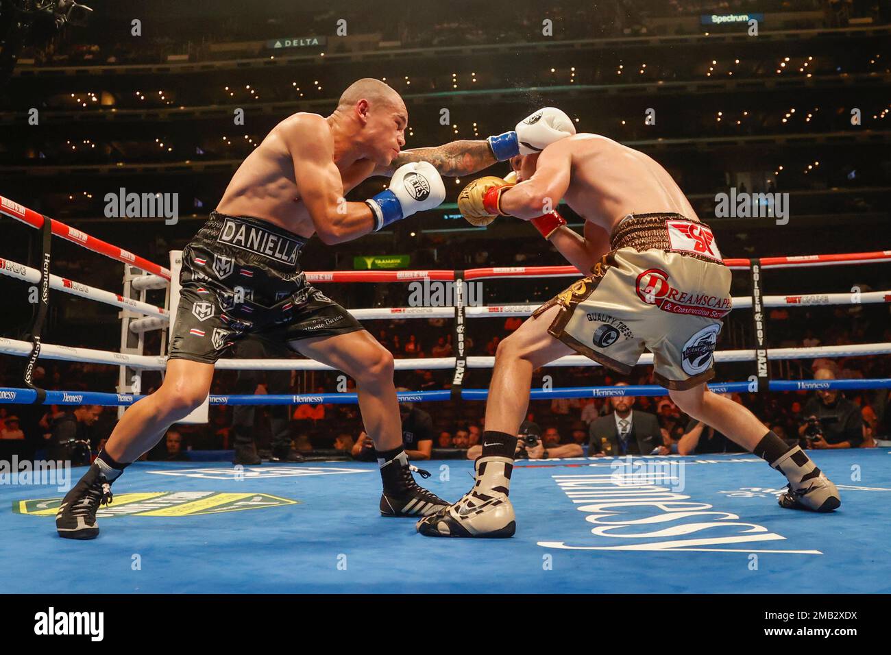 David Jimenez, left, and Ricardo Sandoval fight during a 12 Rounds WBA ...