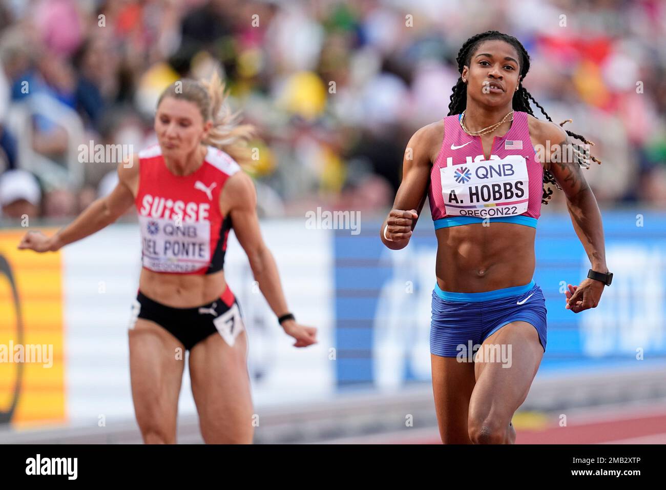 Aleia Hobbs, of the United States, wins a heat ahead of Ajla Del Ponte ...