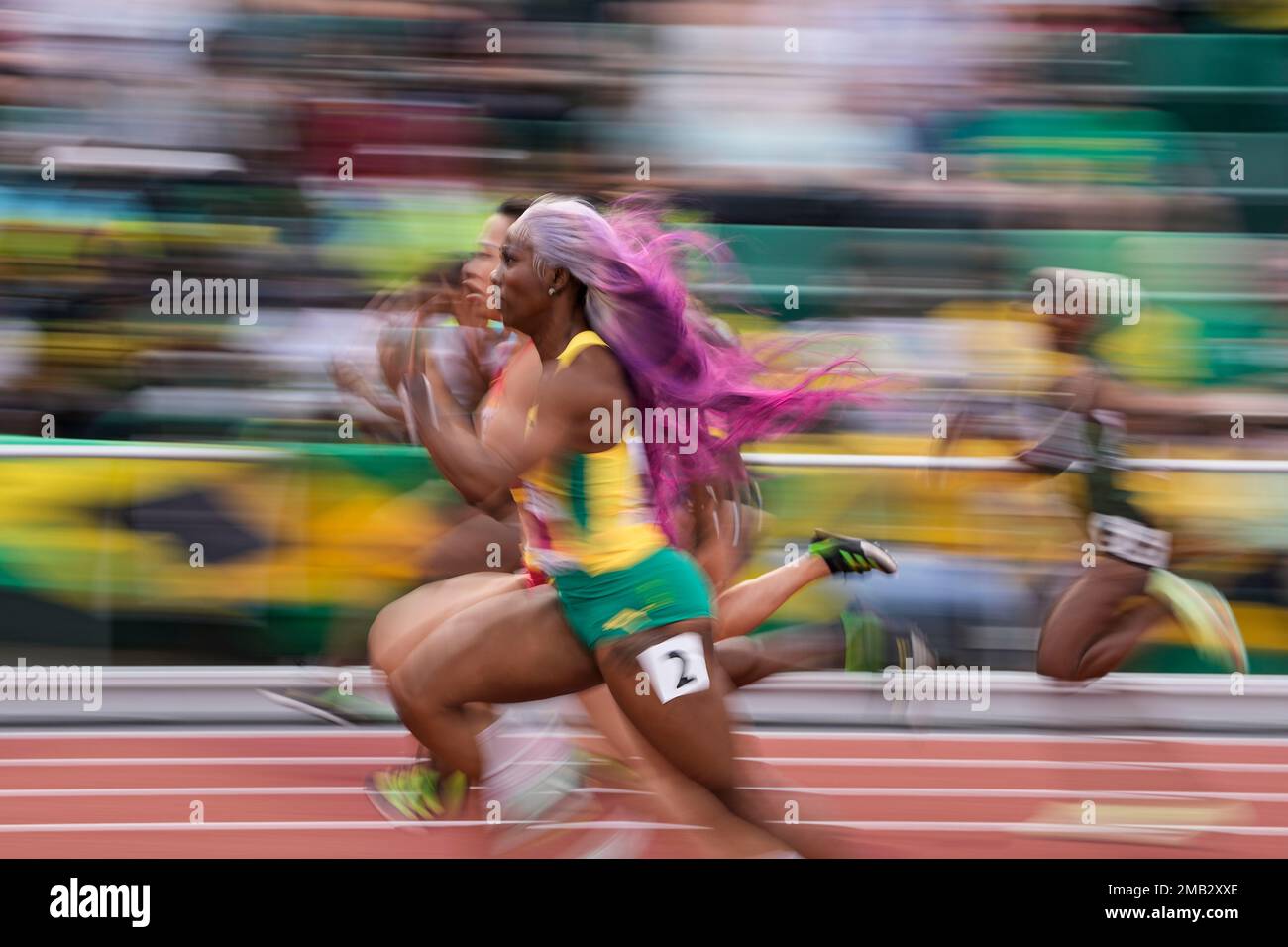 Shelly-Ann Fraser-Pryce, of Jamaica, wins a heat in the women's 100-meter run at the World ...