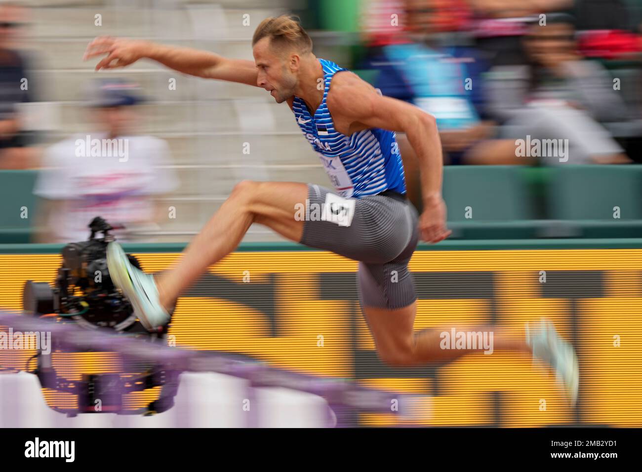 Rasmus Magi, of Estonia, wins a heat in the mens 400-meter hurdles at ...