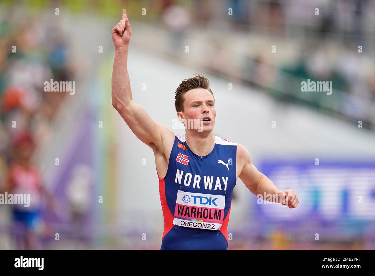 Karsten Warholm, of Norway, wins a heat in the mens 400-meter hurdles ...