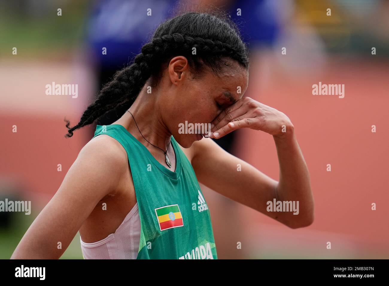 Letesenbet Gidey, of Ethiopia, reacts after winning the women's 10000 ...