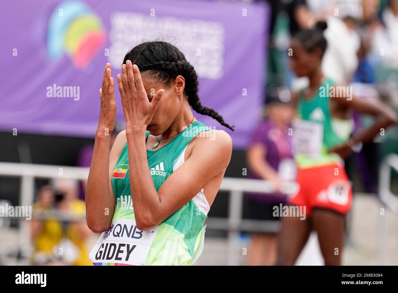 Letesenbet Gidey, of Ethiopia, reacts after winning the women's 10000 ...
