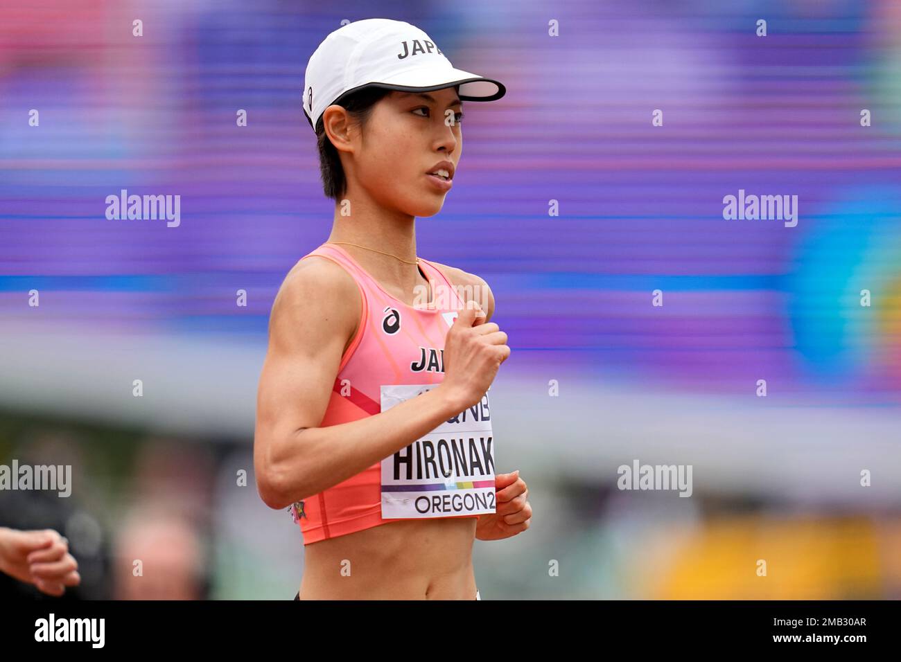 Ririka Hironaka, of Japan, competes in the women's 10000-meter run ...