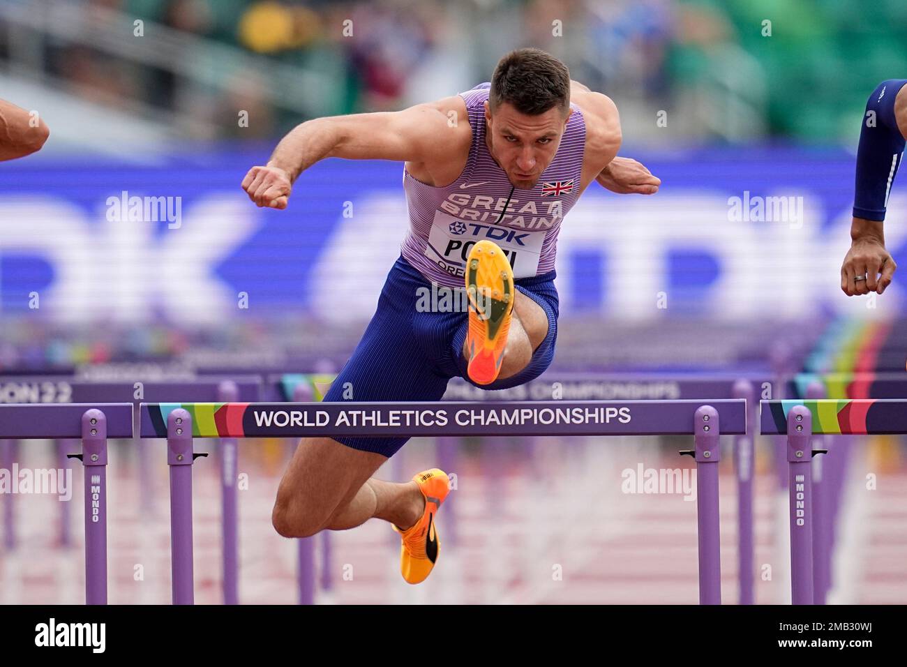 Andrew Pozzi, of Britain, competes in a heat in the mens 110-meter ...