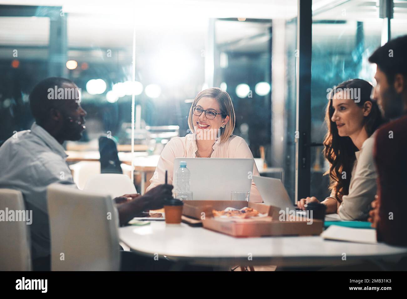 Teamwork, late night and business people at workshop table with ideas ...