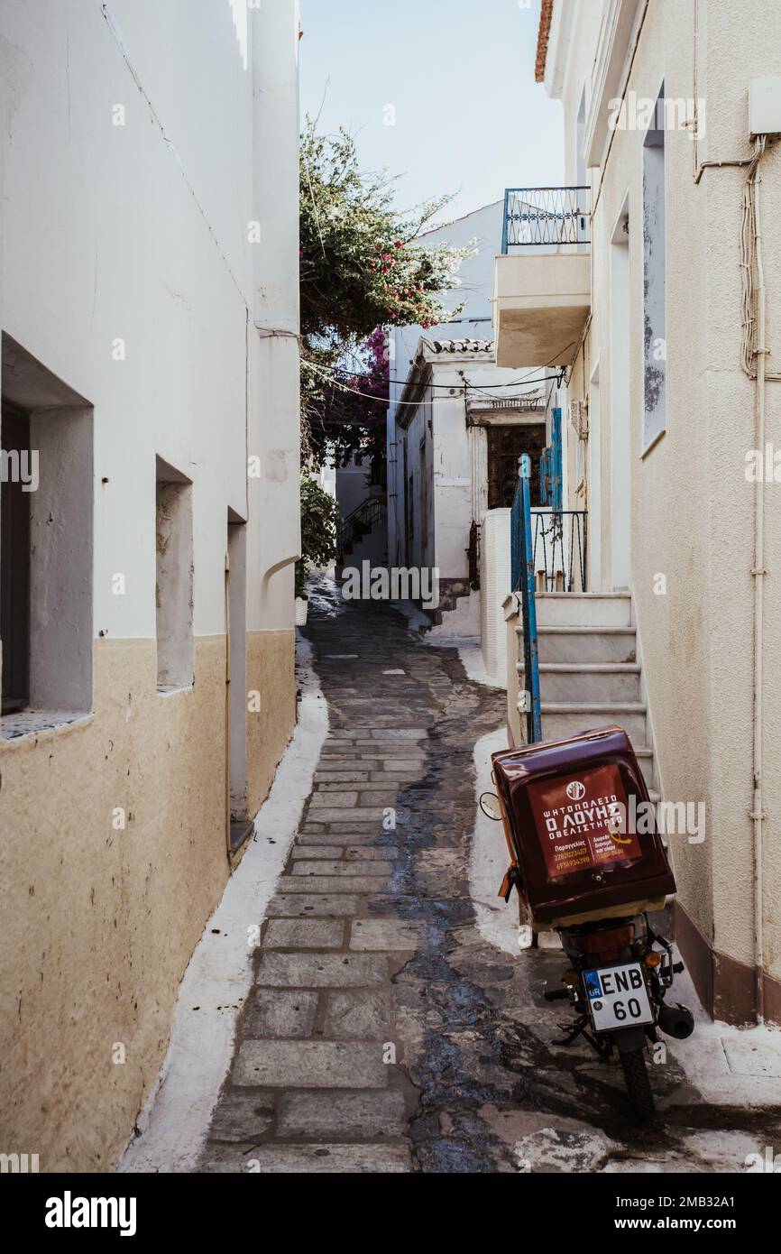 Delivery moto scooter in Chora of Andros Stock Photo - Alamy