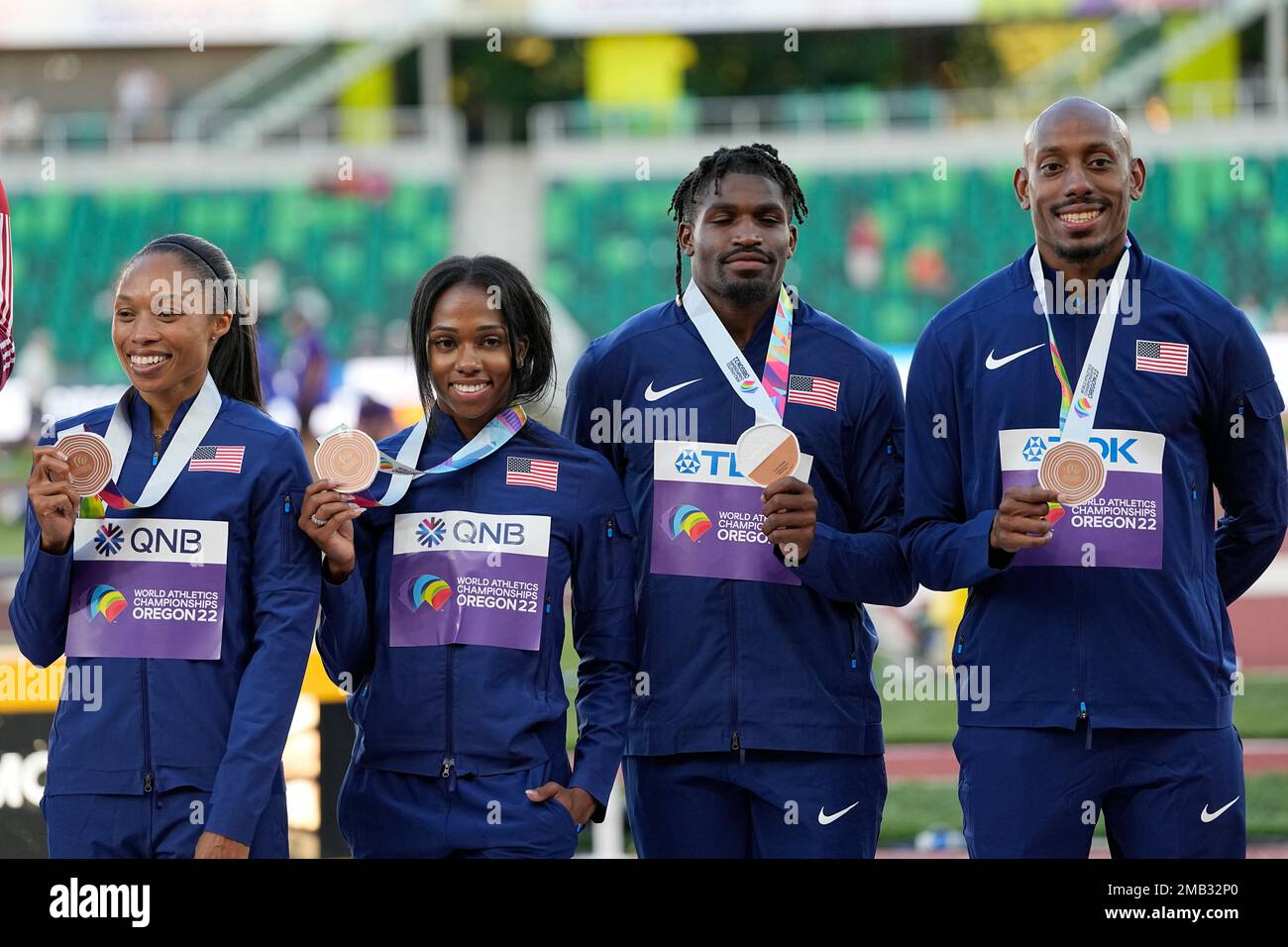 The Usa Team In The 4x400 Meter Mixed Relay Final Pose For A Photo With