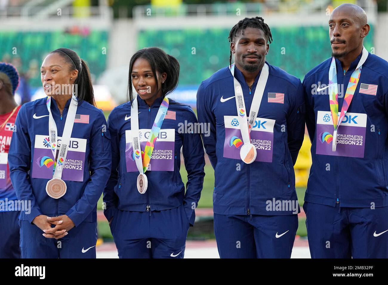 The USA team in the 4x400-meter mixed relay final pose for a photo at ...