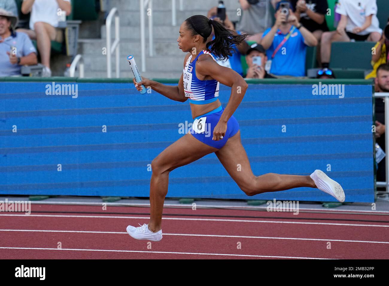Allyson Felix, of the United States, runs in the 4x400-meter mixed ...