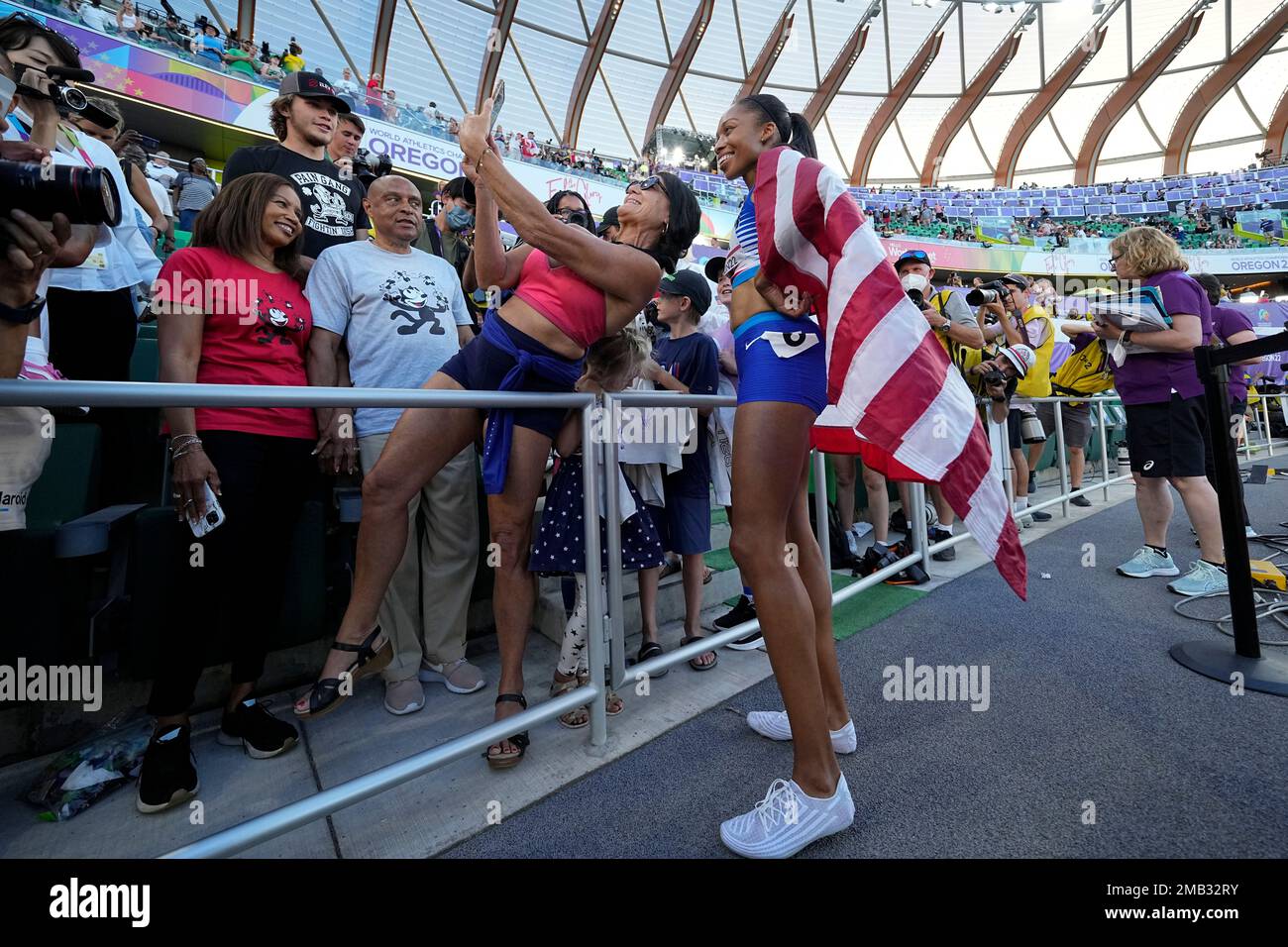 Allyson Felix, of the United States, poses after the 4x400-meter mixed ...