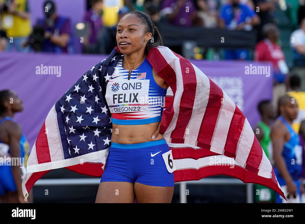 Allyson Felix, of the United States, smiles after the 4x400-meter mixed ...
