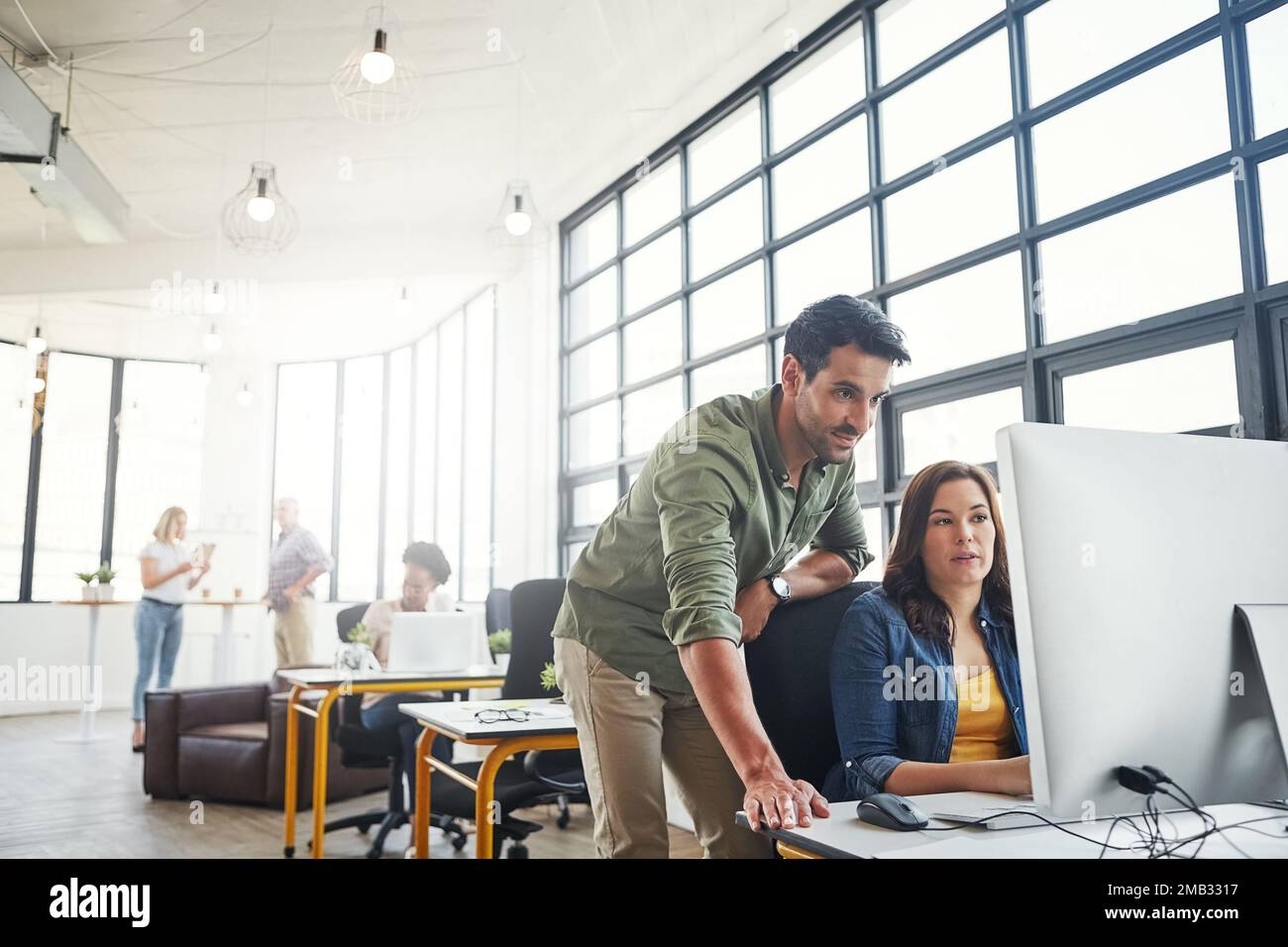 Business people, computer and training with team and leader help in ...