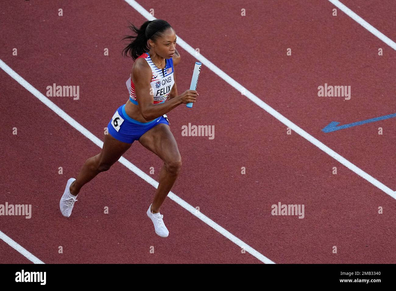 Allyson Felix, of the United States, runs in the the 4x400-meter mixed ...