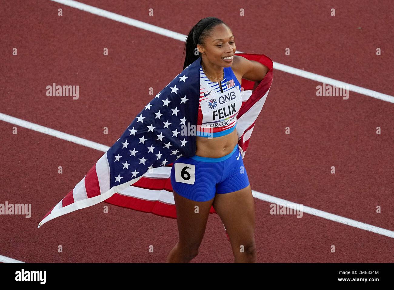 Allyson Felix, of the United States, smiles after the 4x400-meter mixed ...