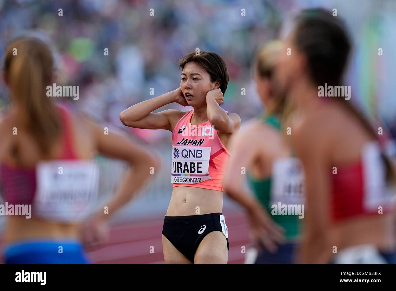 Ran Urabe, of Japan, reacts after a heat in the the women's 1500-meter run at the World ...