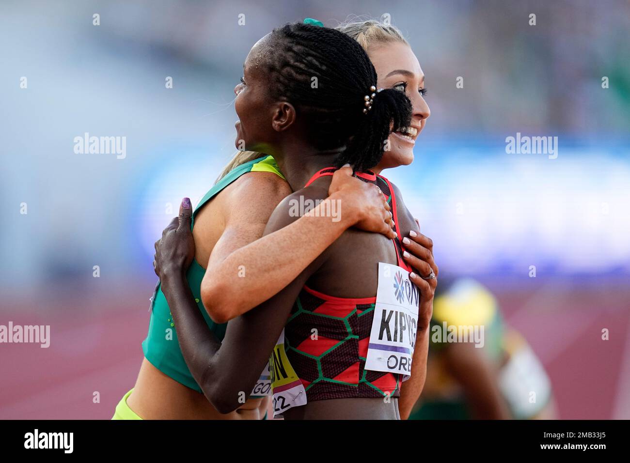 Faith Kipyegon, of Kenya, and Jessica Hull, of Australia, hug after a ...
