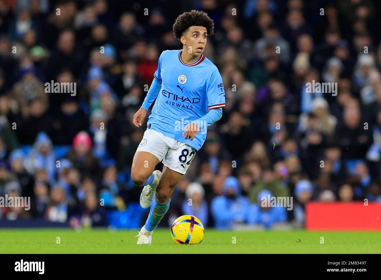 Rico Lewis #82 of Manchester City in action during the Premier League ...