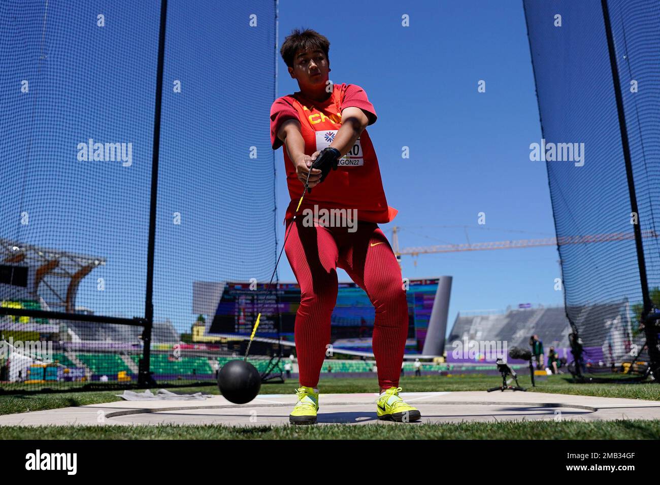 Zhao Jie, of China, competes during qualifying for the women's hammer ...