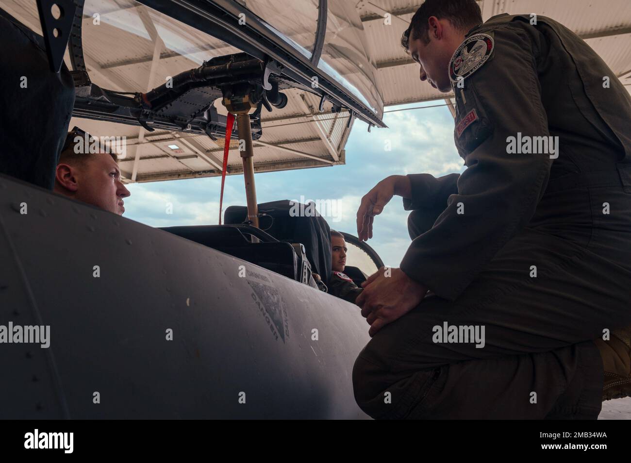 First Term Officer Course students sit in the cockpit of an F-15E ...
