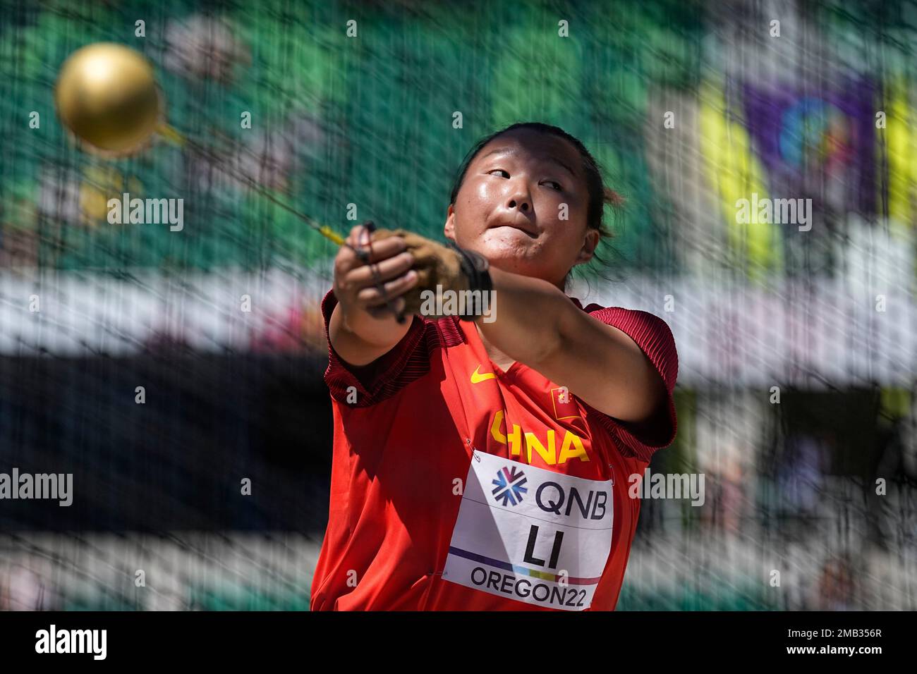 Li Jiangyan, of China, competes in the hammer throw at the World ...