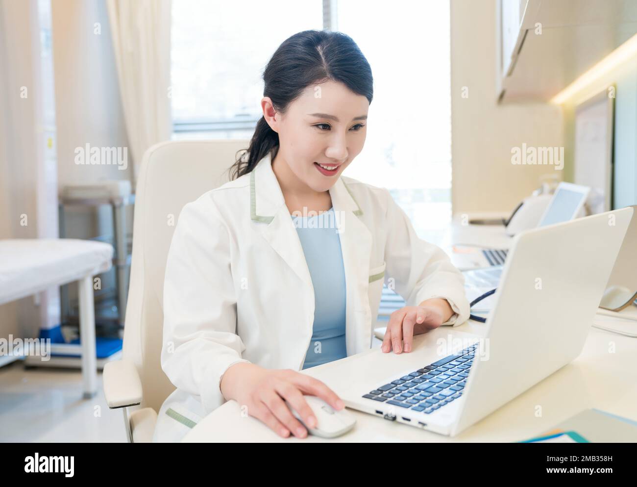 Professional female doctor portraits Stock Photo - Alamy