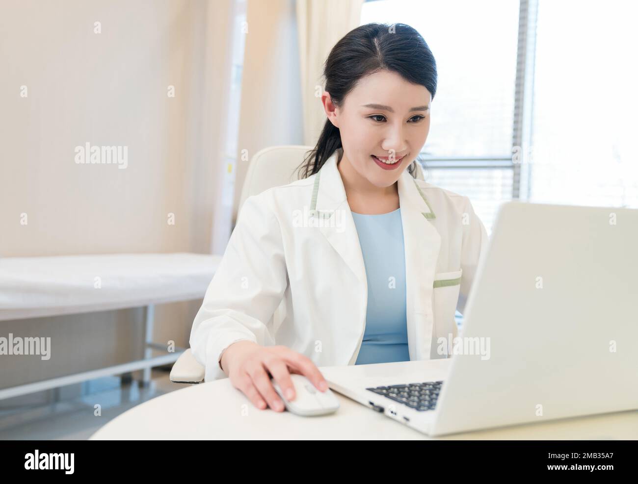Professional female doctor portraits Stock Photo - Alamy