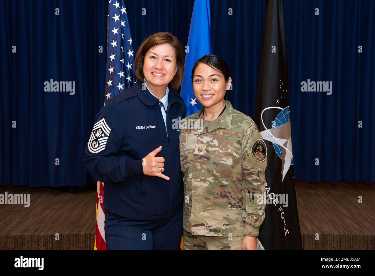 Chief Master Sergeant of the Air Force JoAnne S. Bass poses for a photo with U.S. Air Force ...