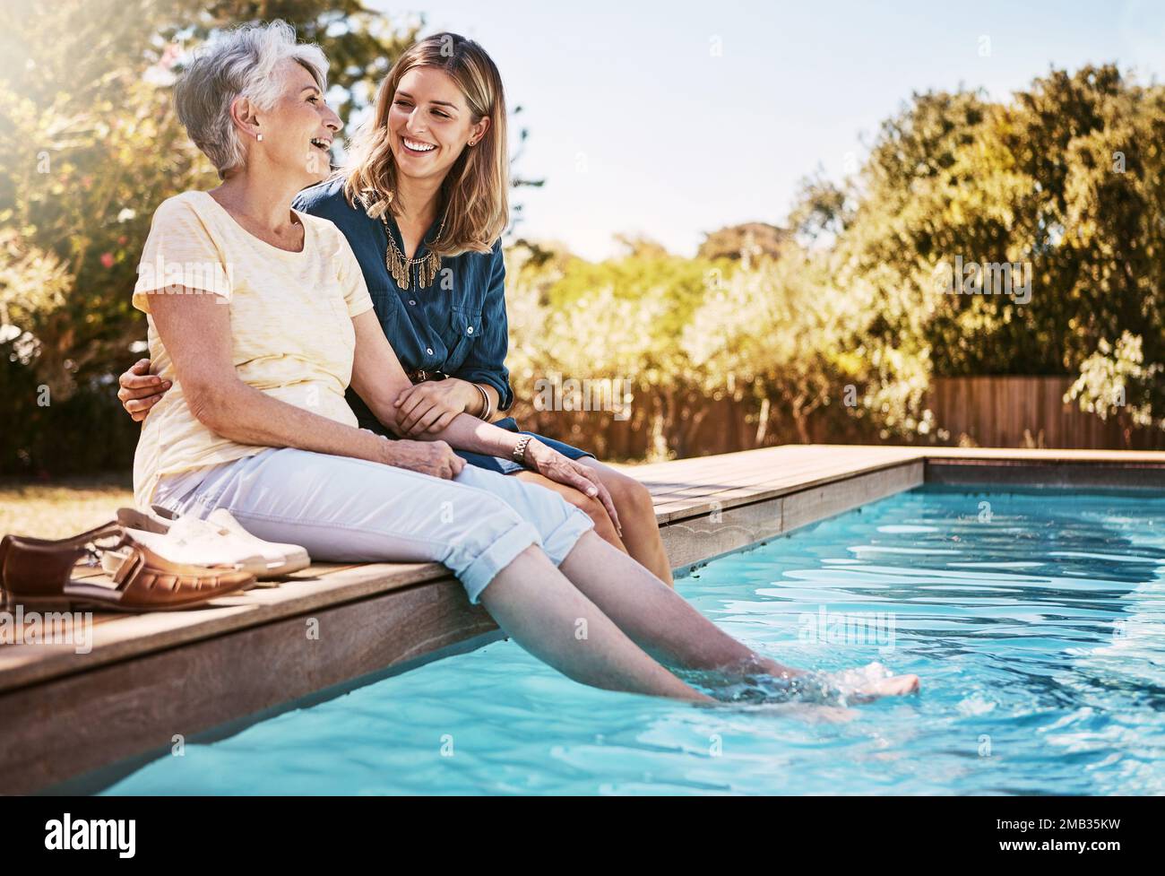 Family, women by pool and relax together with love and care, quality ...
