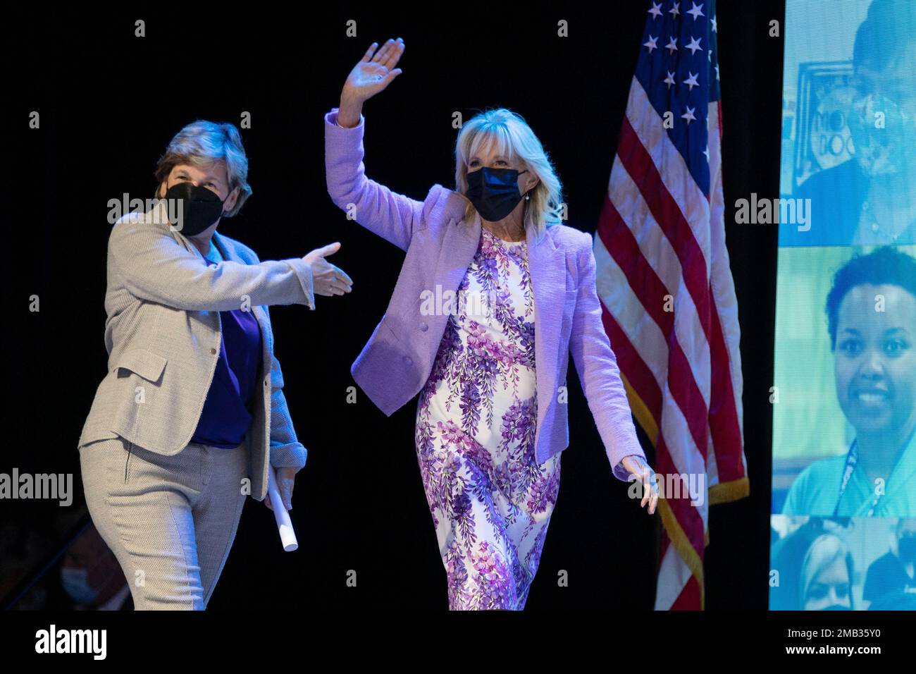 First lady Jill Biden walks on stage with the president of the American ...