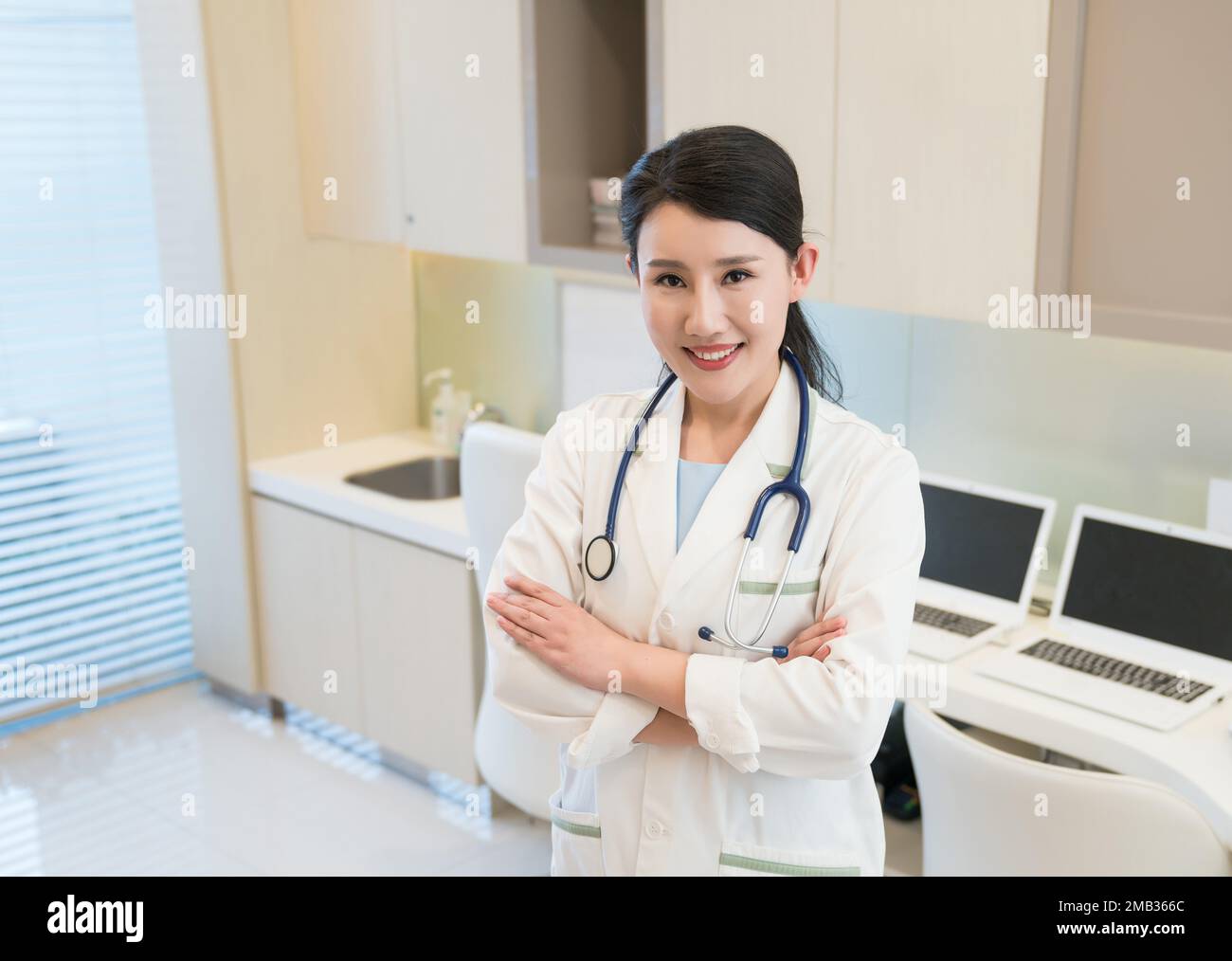 Professional female doctor portraits Stock Photo - Alamy