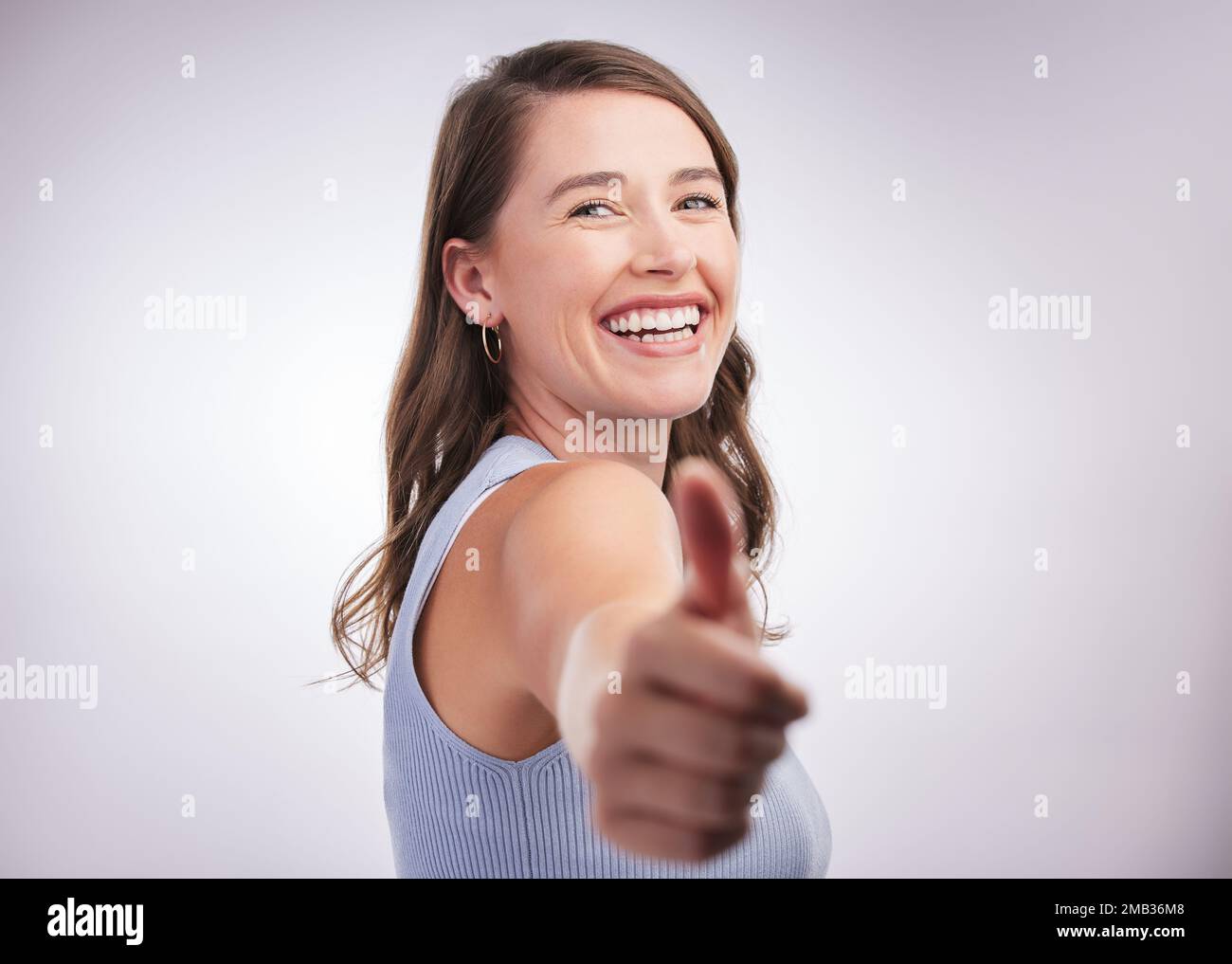 Now thats something I can get behind. Studio portrait of a happy young ...