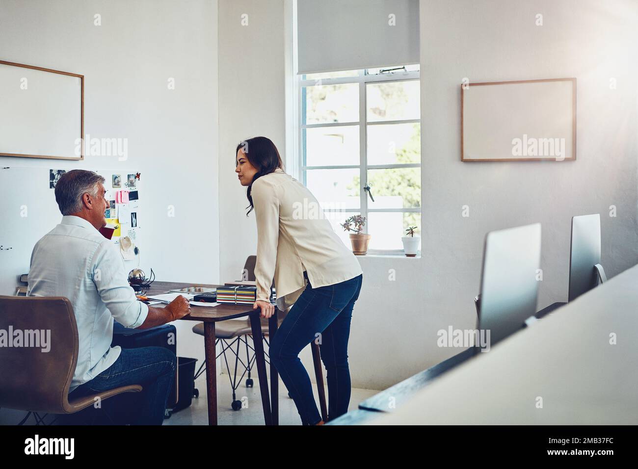 Office, teamwork and business people by desk talking in modern ...