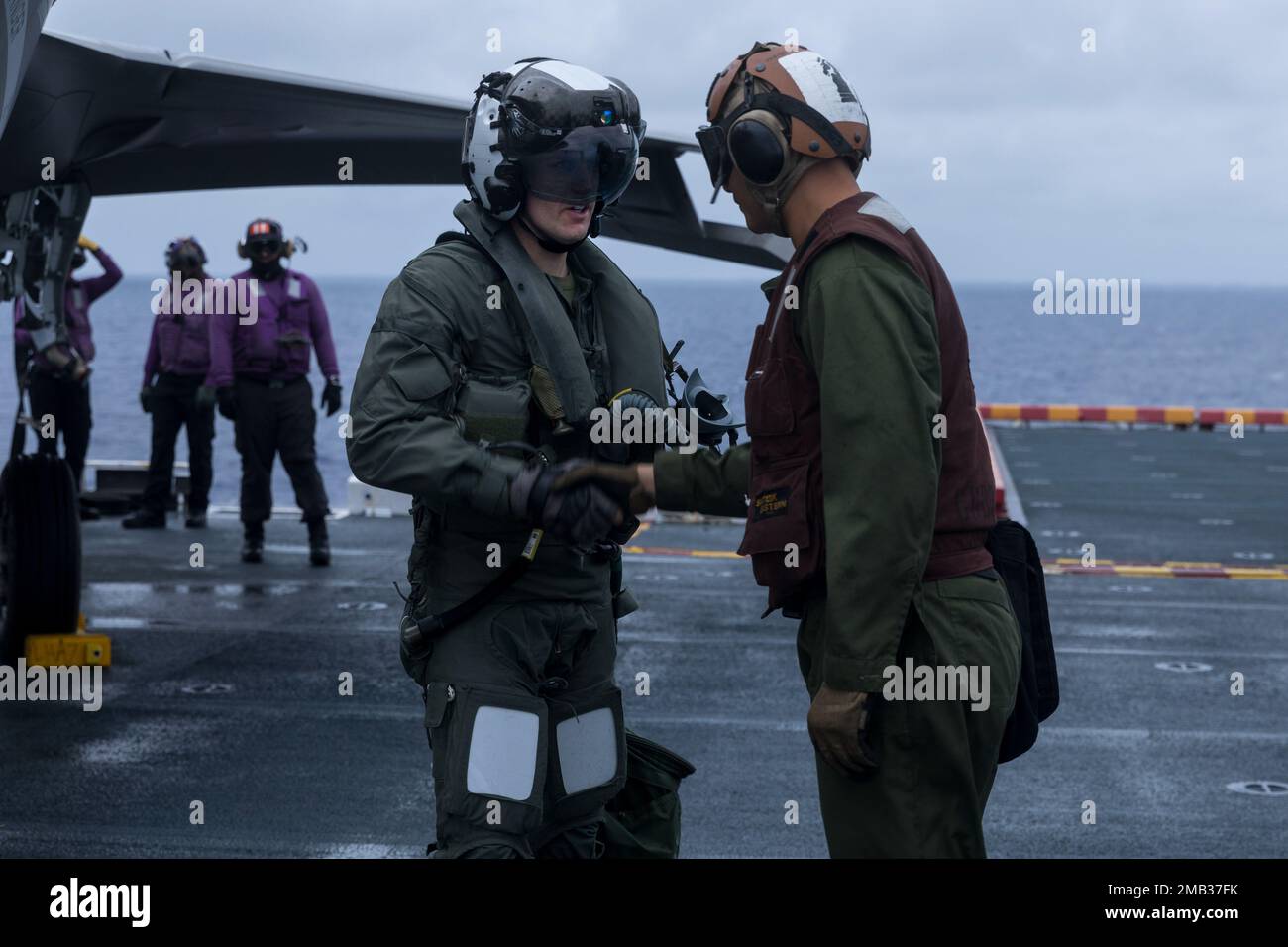 U.S. Marine Corps Capt. Nick Kachulis, a pilot, left, and Cpl. Michael ...