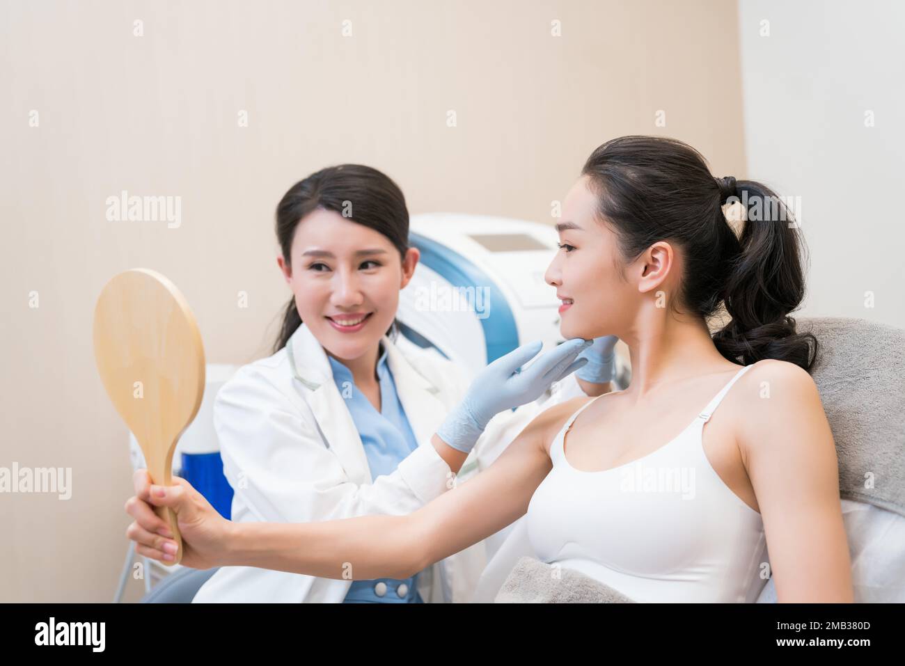 Professional reception young woman Stock Photo - Alamy