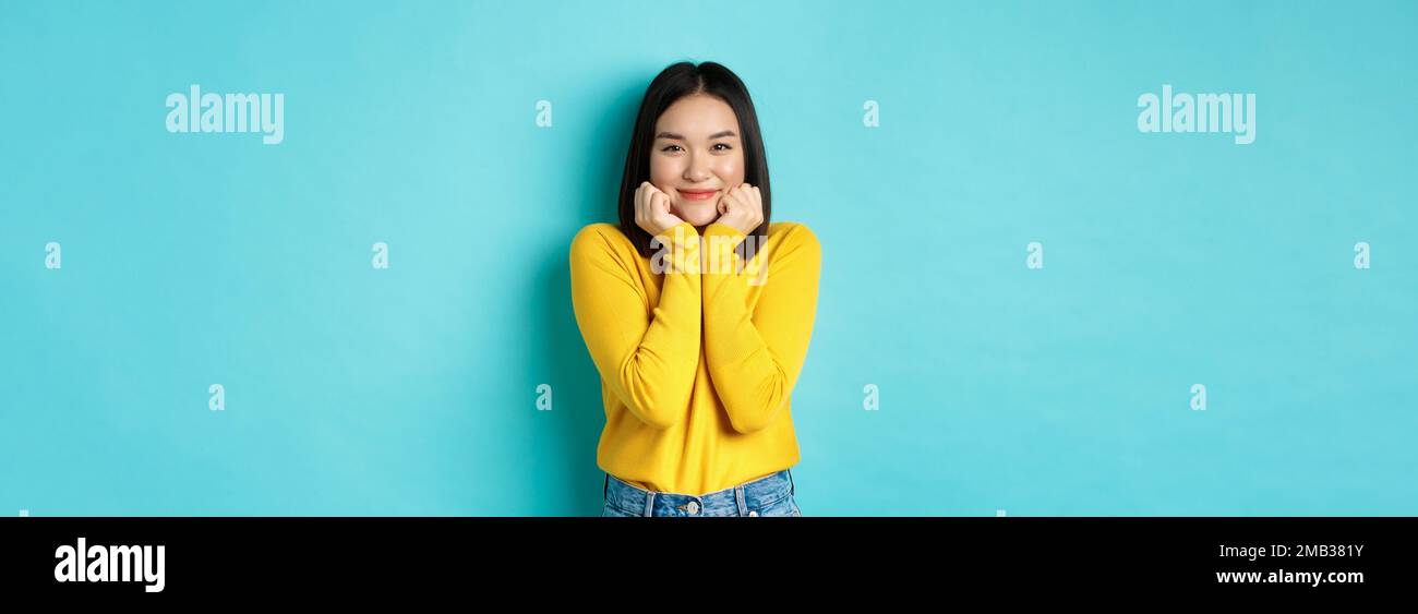 Beauty and fashion concept. Beautiful asian woman blushing and smiling ...