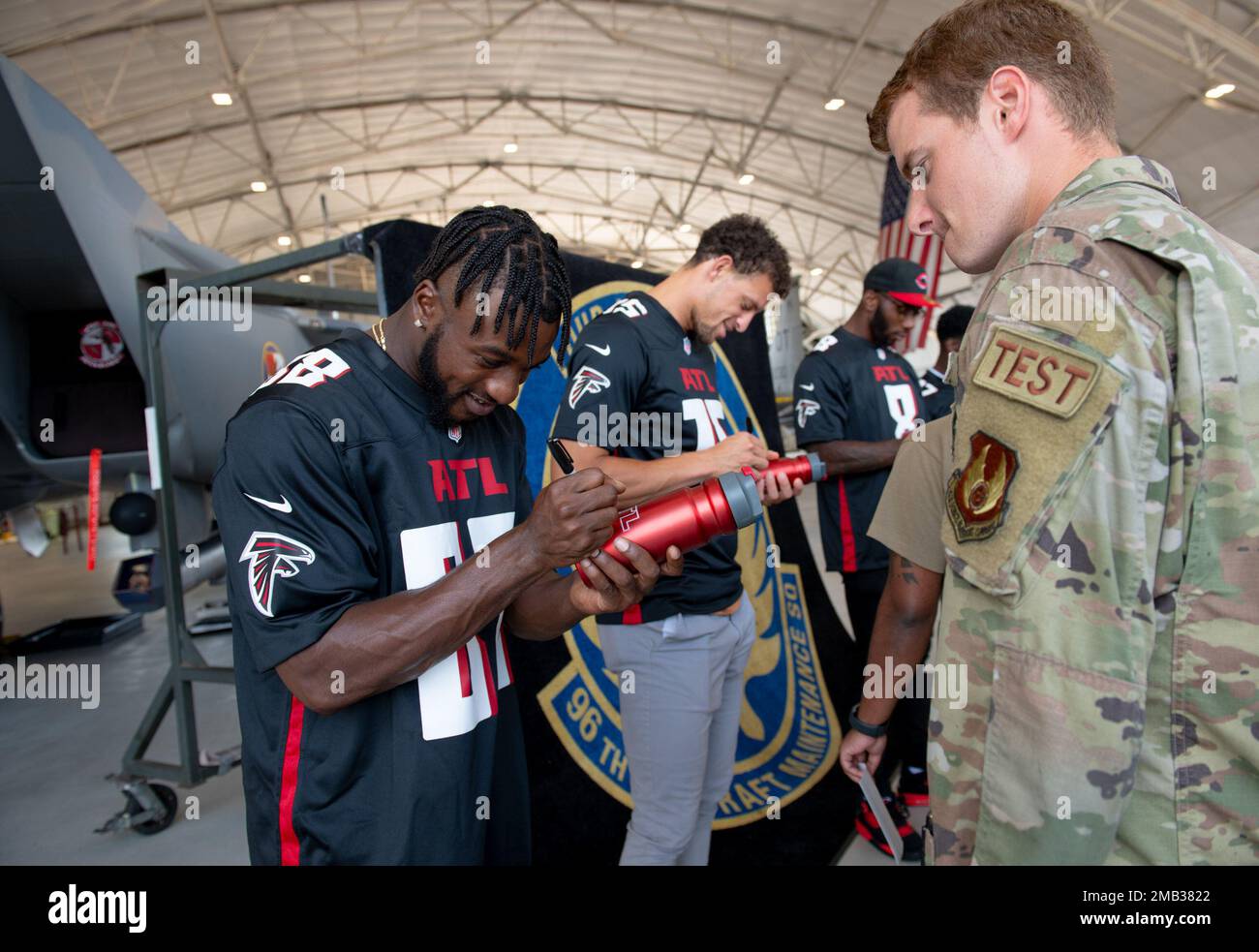 Members of the Atlanta Falcons football team signed autographs June 10 ...