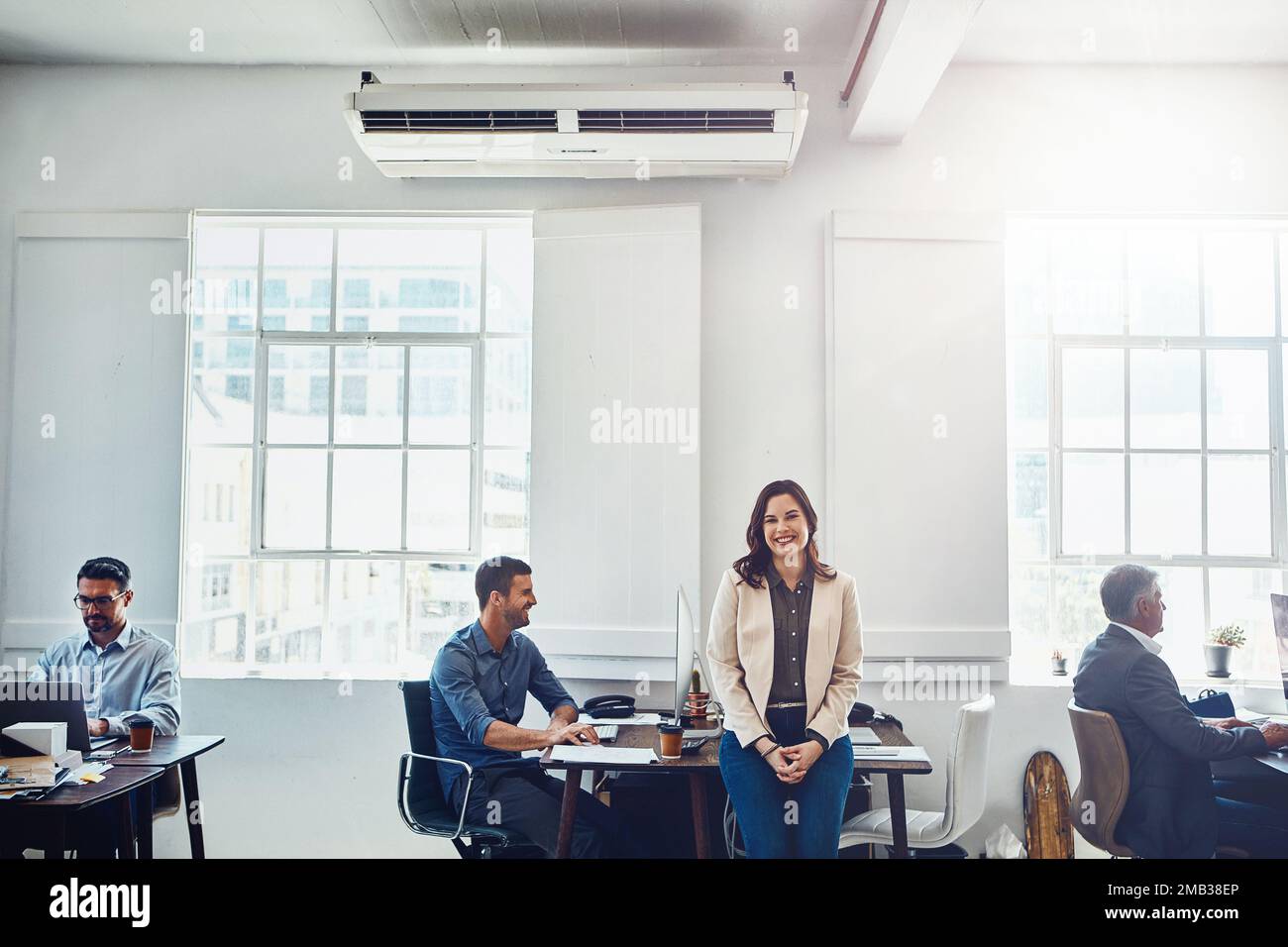 Leadership, office building and portrait of woman with business people ...