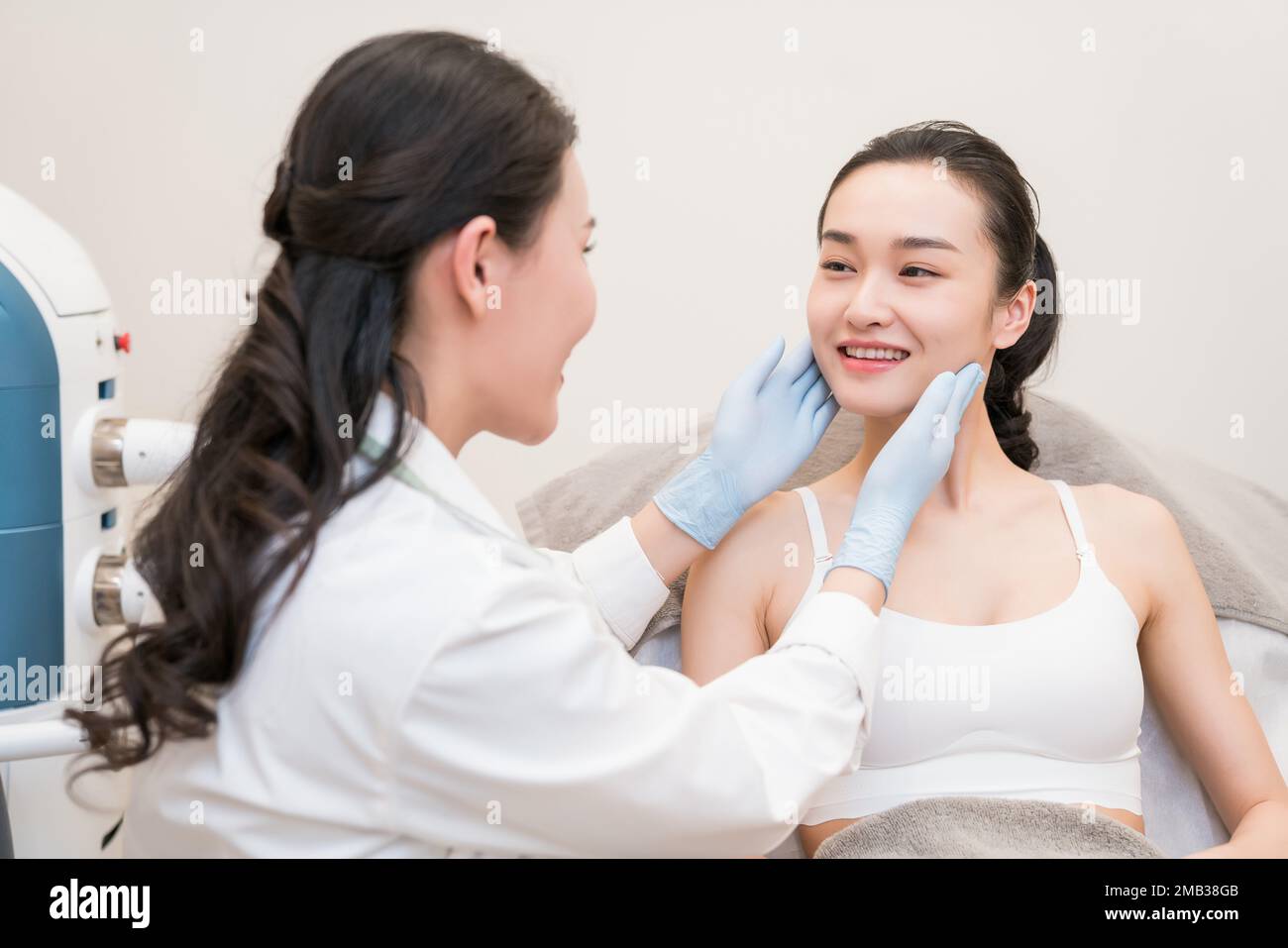 Professional reception young woman Stock Photo - Alamy