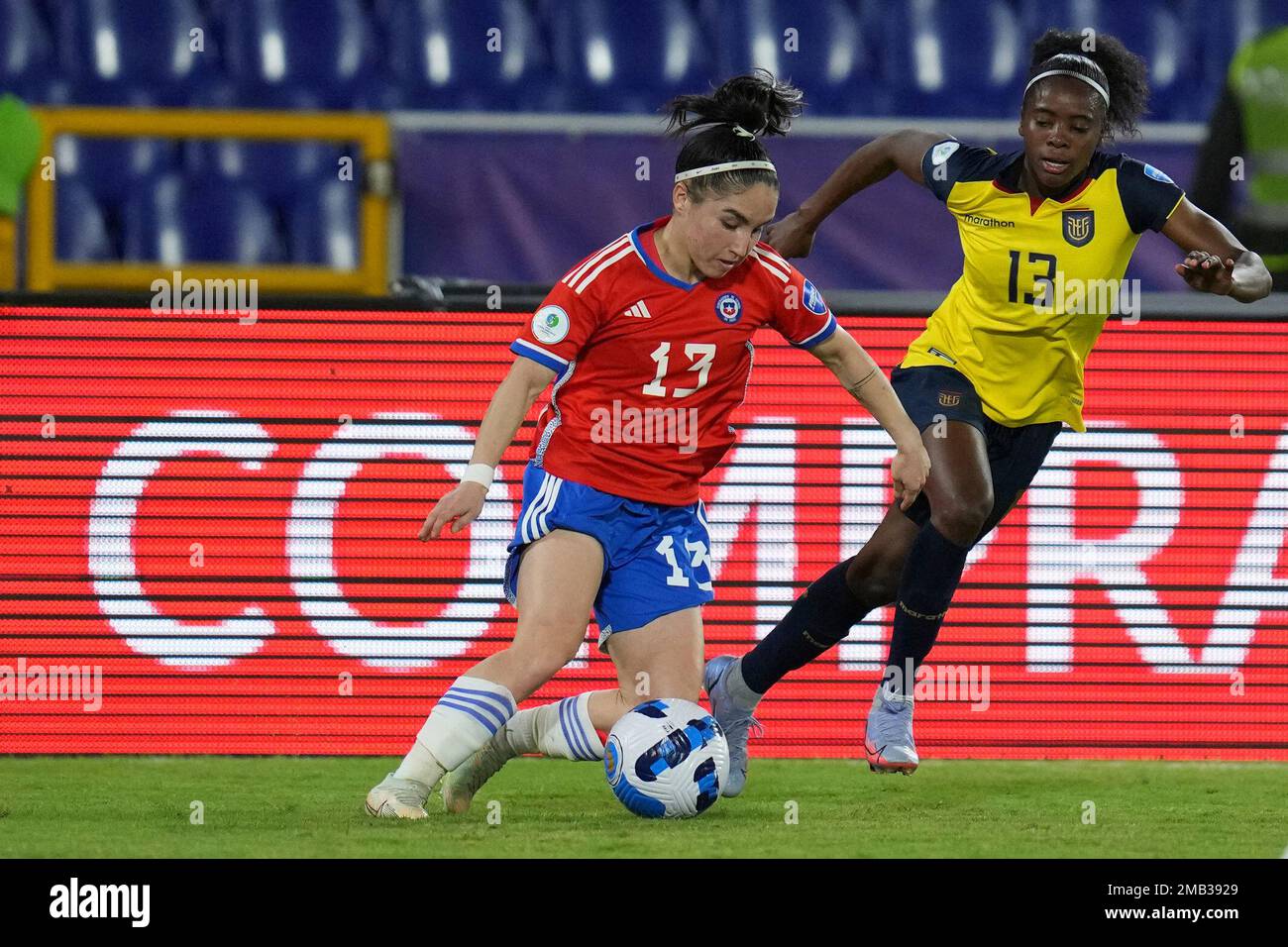 Chile's Javiera Grez, left, and Ecuador's Nicole Charcopa fight for the ...