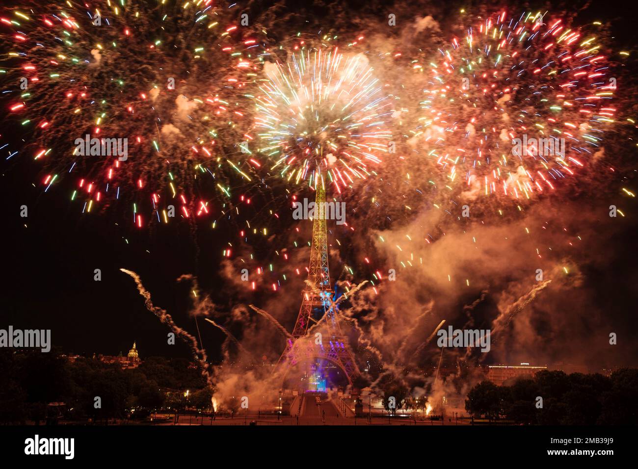 Fireworks illuminate the Eiffel Tower in Paris during Bastille Day ...