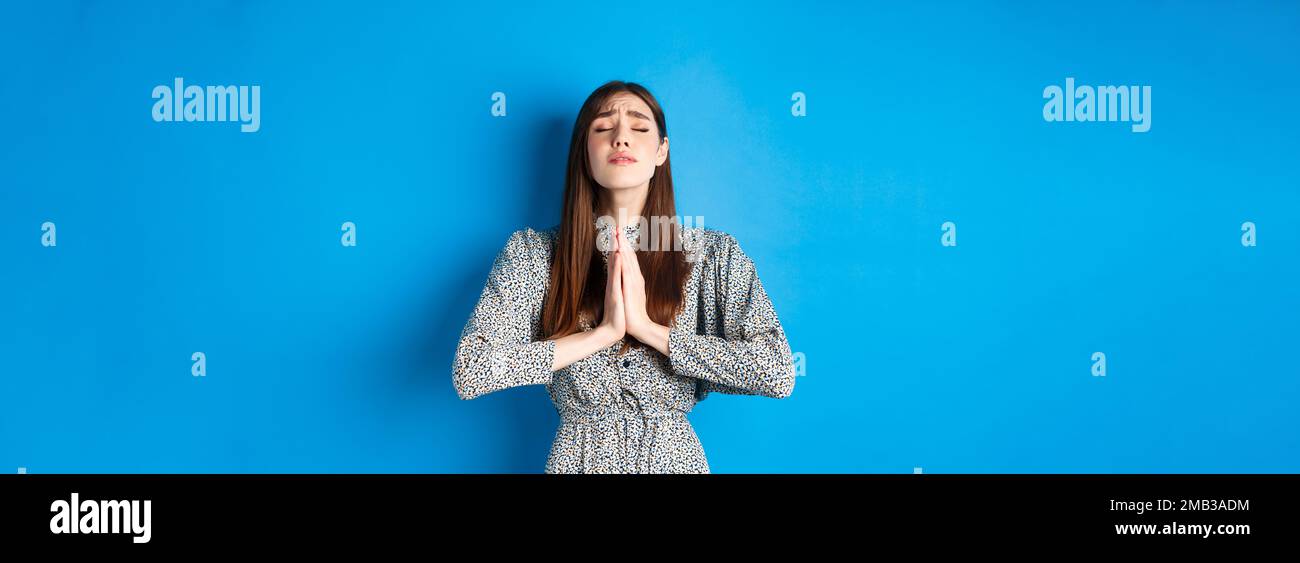 Pleading woman in dress begging for wish come true, supplicating god ...