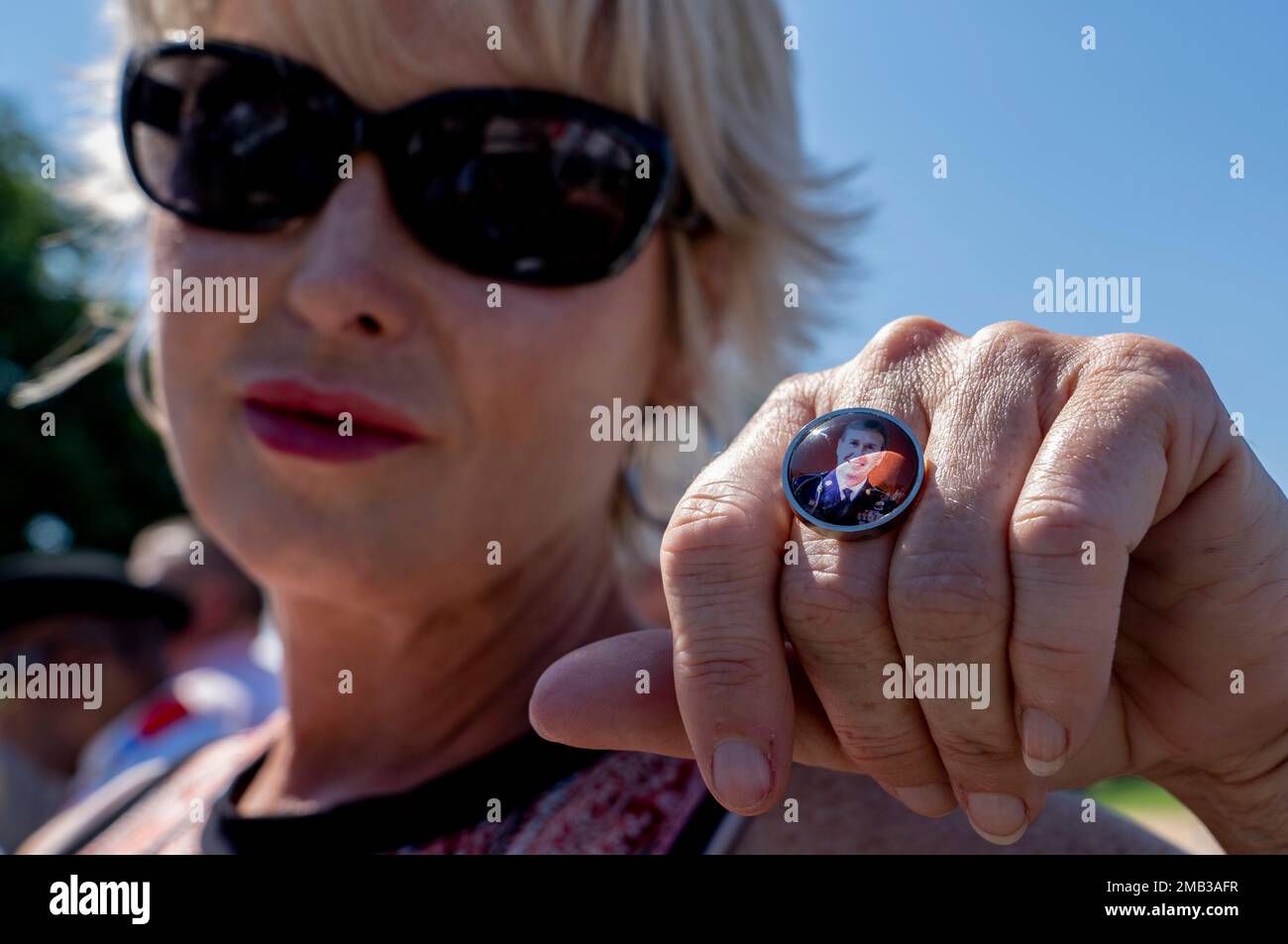 Robin Archer, from Fayetteville, Ark., wears a ring with a picture of ...
