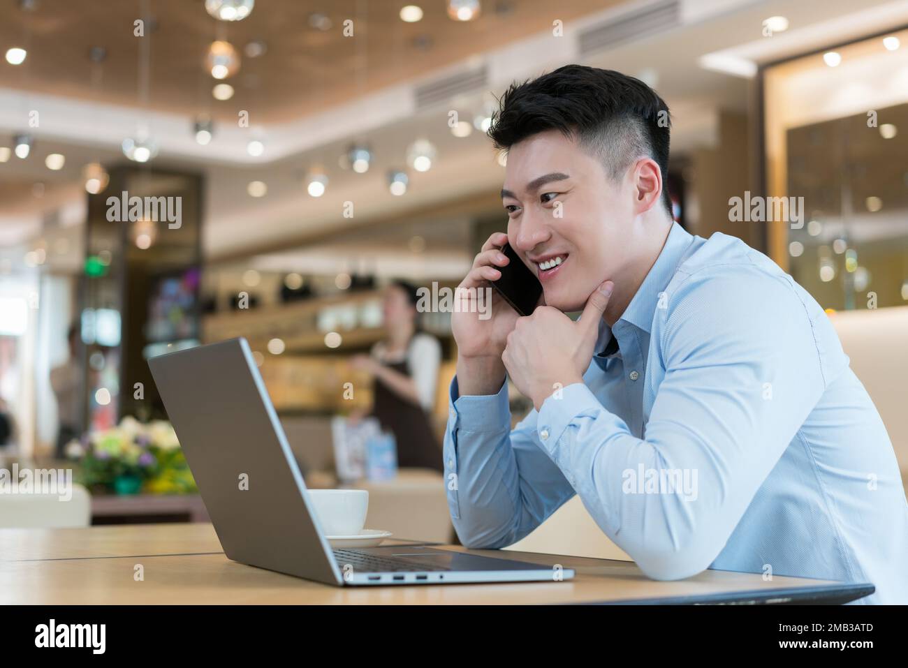 Business men in the Internet cafe Stock Photo - Alamy