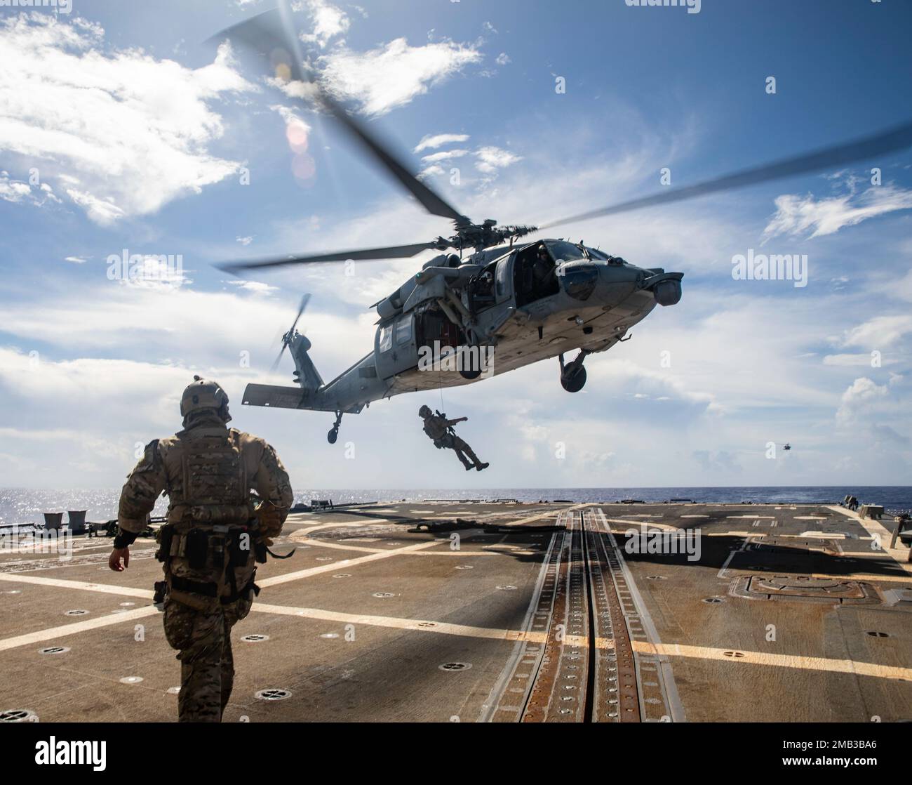 PHILIPPINE SEA (June 10, 2022) Sailors recover onto an MH-60S Sea Hawk ...