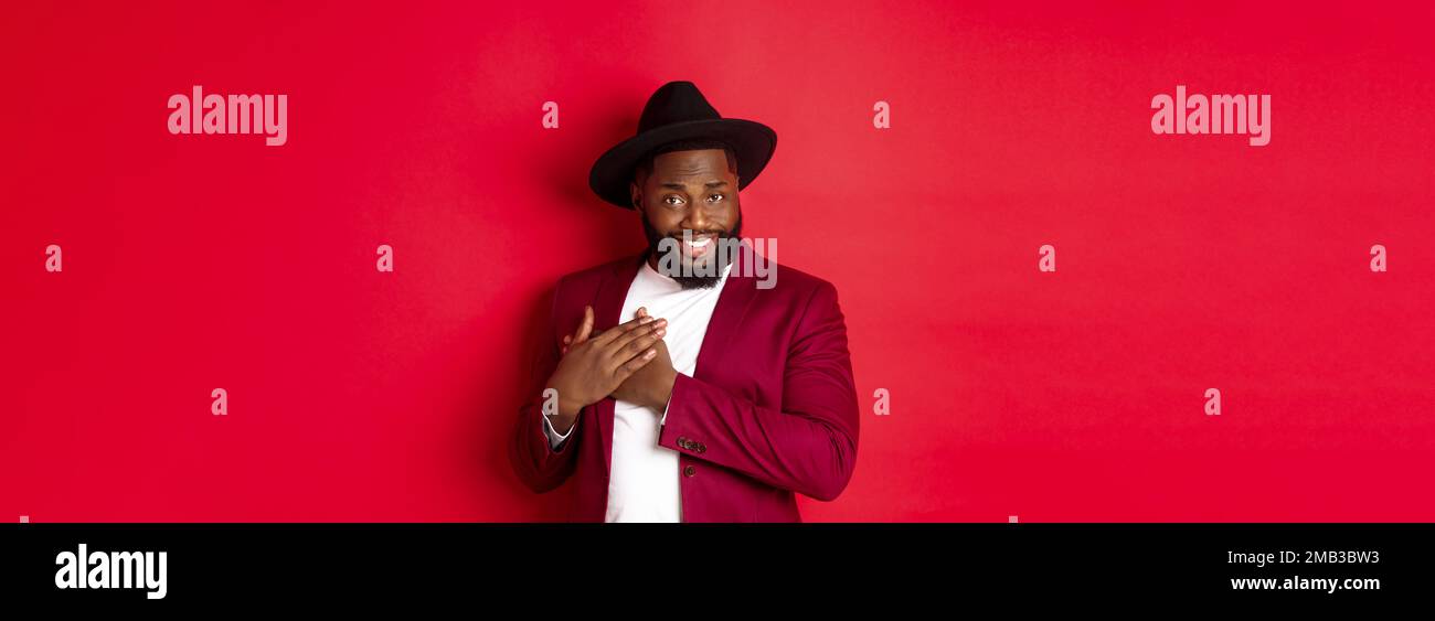 Fashion and party concept. Handsome african american macho man flirting ...