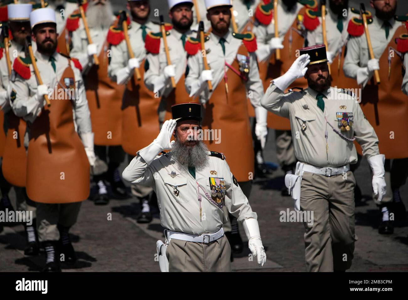 Soldiers from the Foreign Legion march during the Bastille Day parade ...