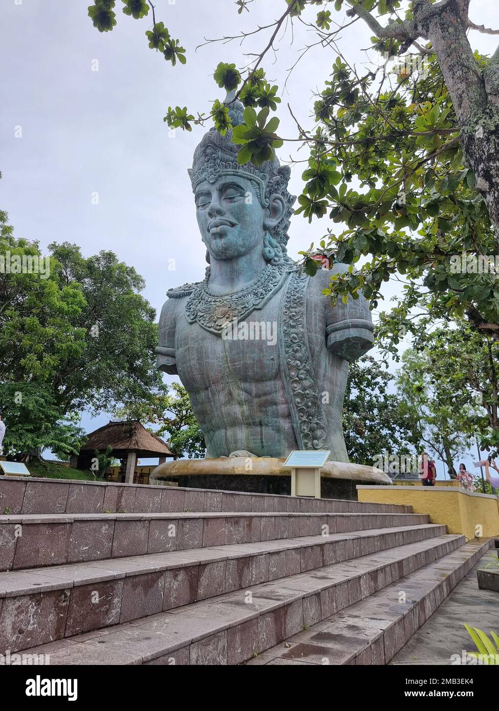 A vertical shot of a giant statue of Vishnu in the Garuda Wisnu Kencana ...